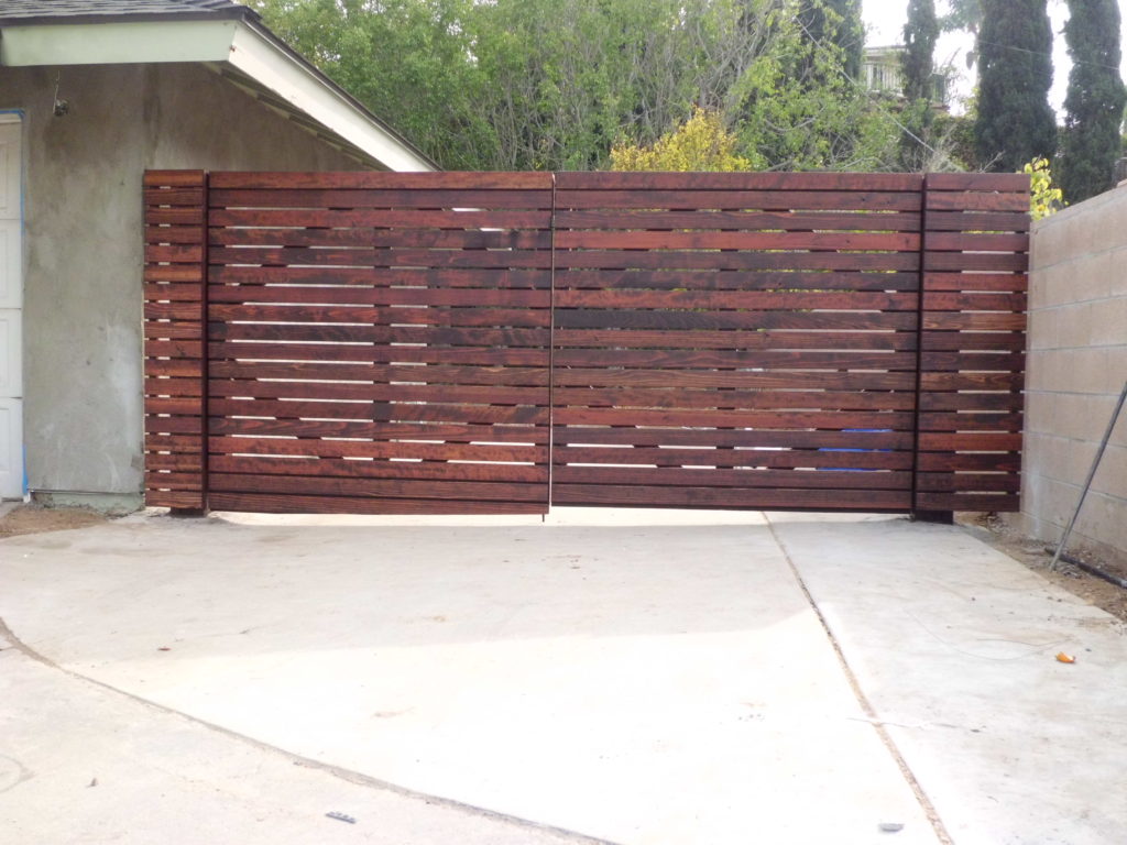 Custom Stained Redwood 1x4 Horizontal Fence with Matching Driveway and ...
